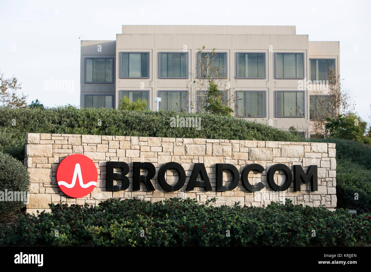A logo sign outside of the headquarters of the Broadcom Corporation in ...