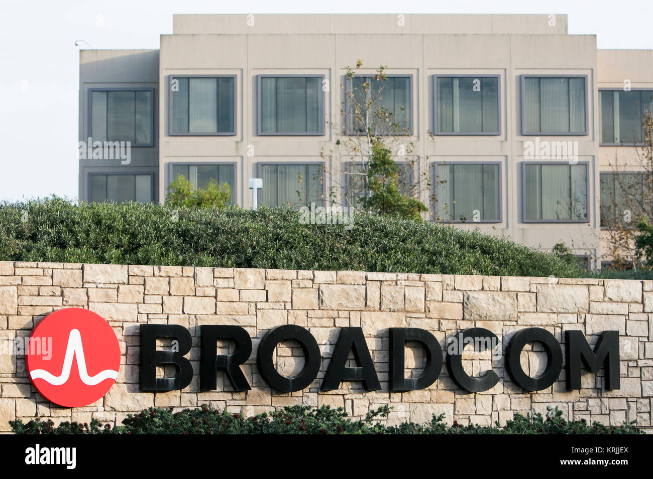A logo sign outside of the headquarters of the Broadcom Corporation in ...