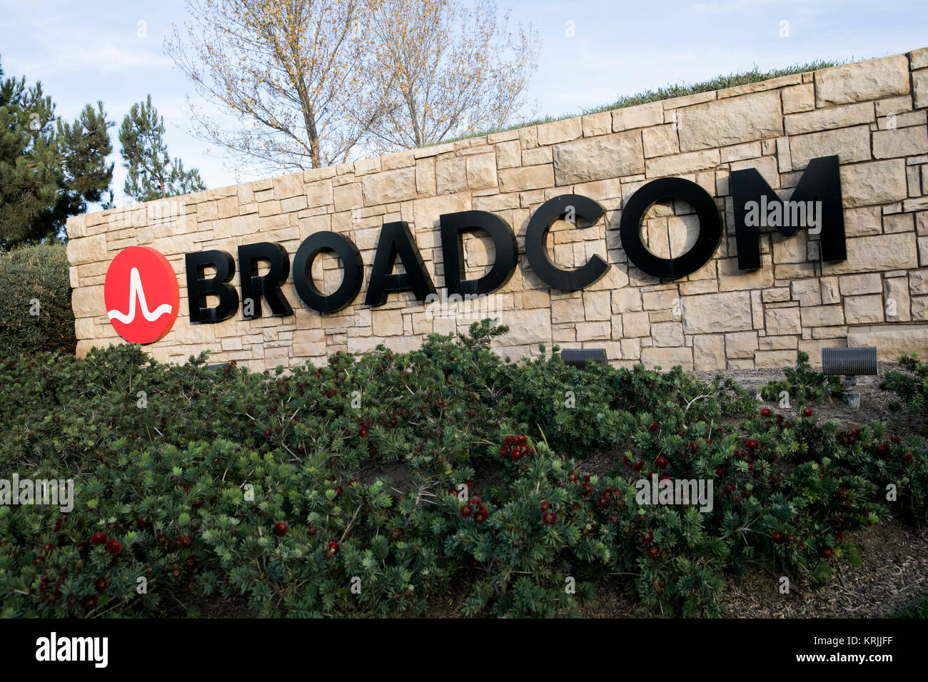 A logo sign outside of the headquarters of the Broadcom Corporation in ...