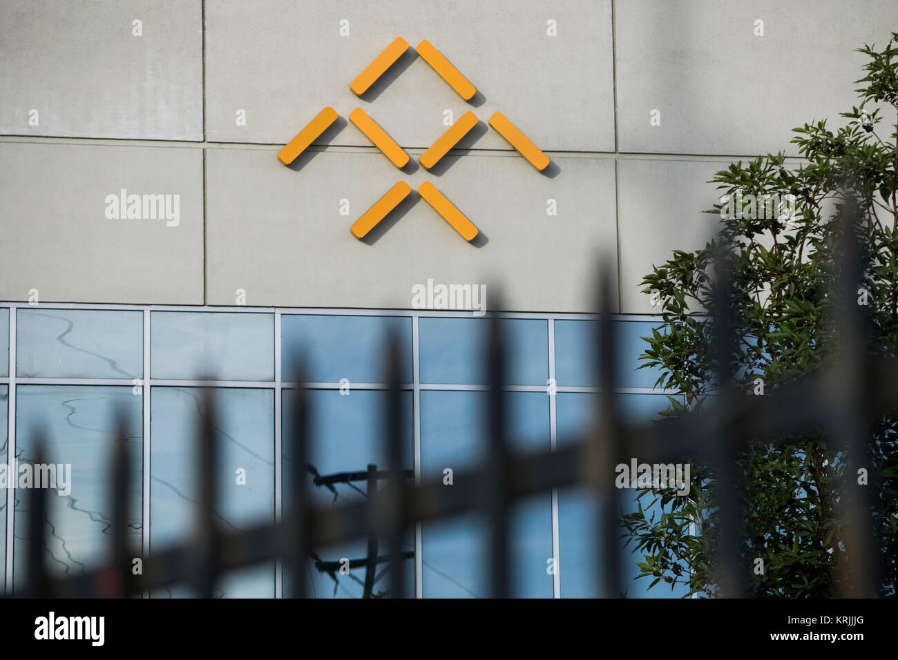 A logo sign outside of the headquarters of Faraday Future in Gardena ...