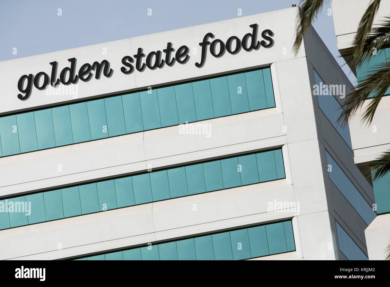A logo sign outside of the headquarters of Golden State Foods in Irvine ...
