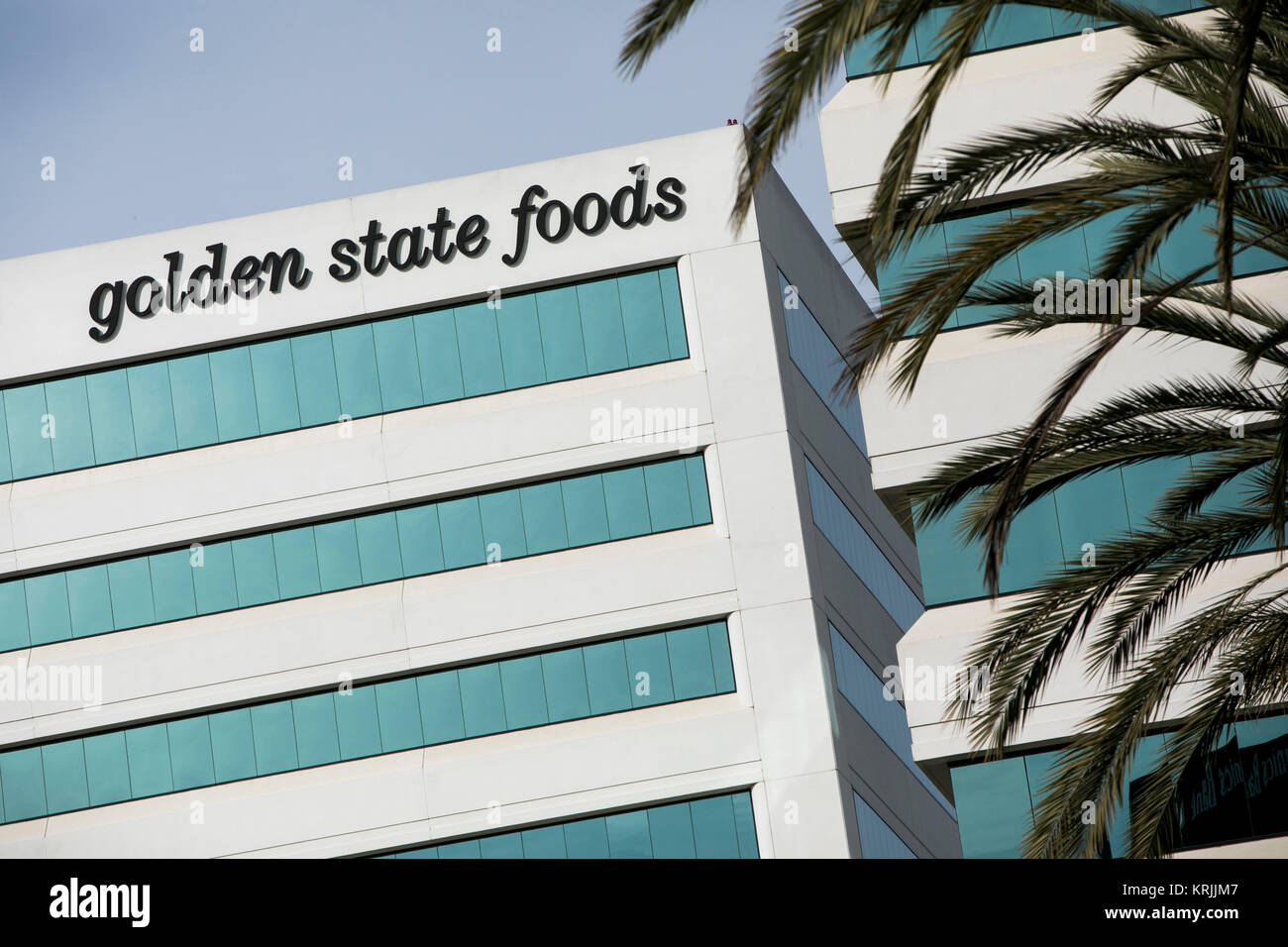 A logo sign outside of the headquarters of Golden State Foods in Irvine ...