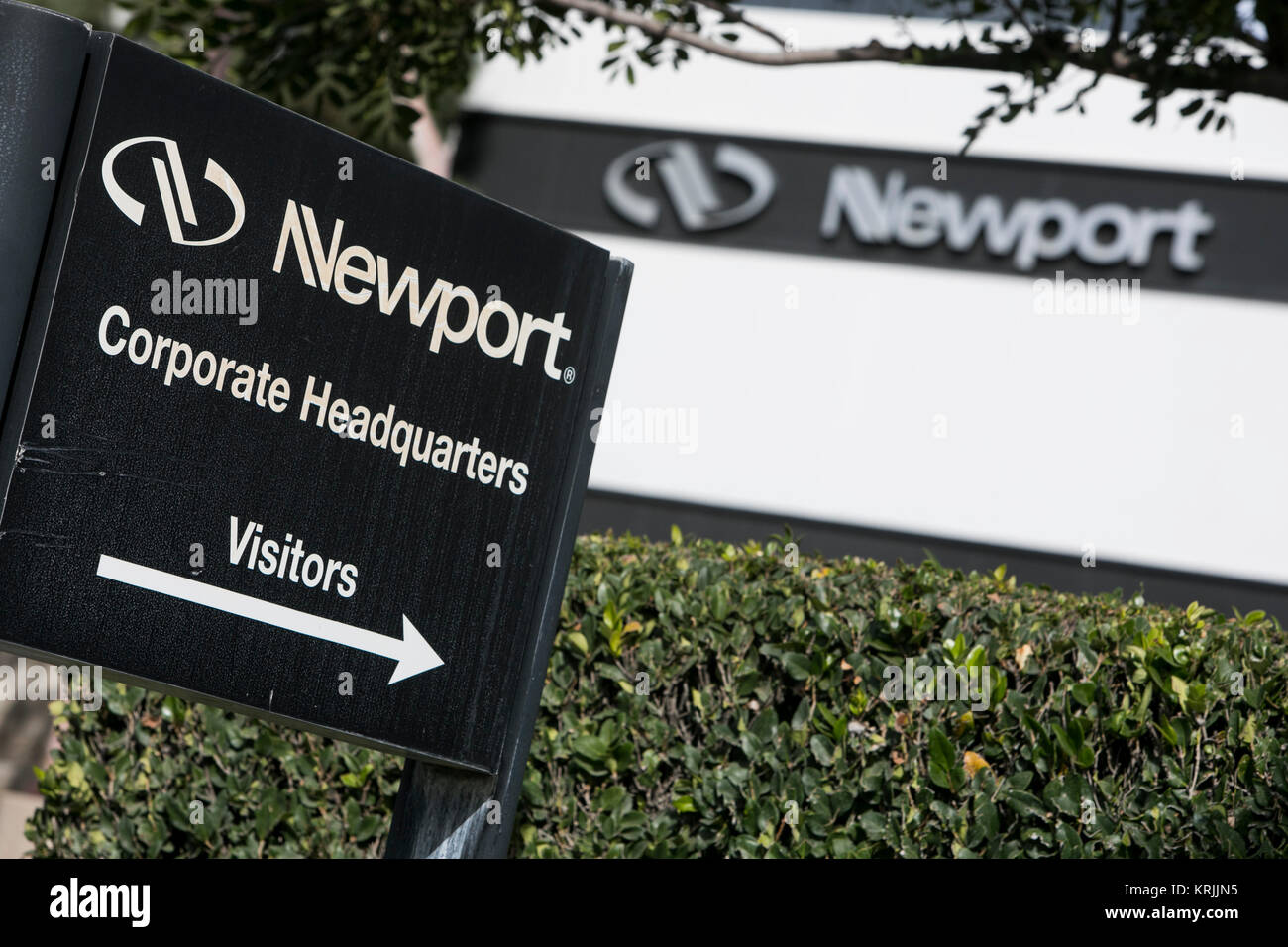 A logo sign outside of the headquarters of the Newport Corporation in ...