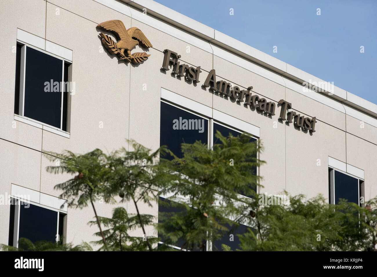 A logo sign outside of the headquarters of the First American Financial ...