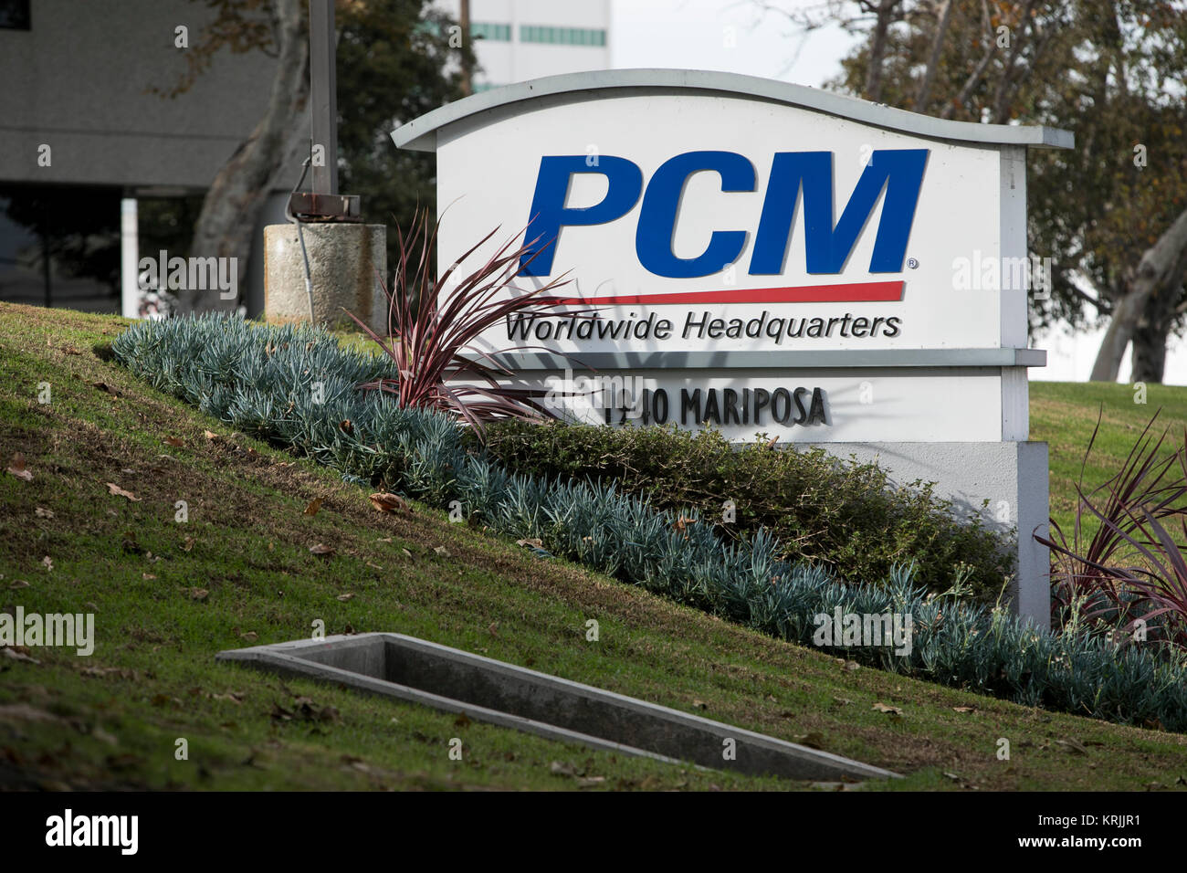 A logo sign outside of the headquarters of PCM in El Segundo ...