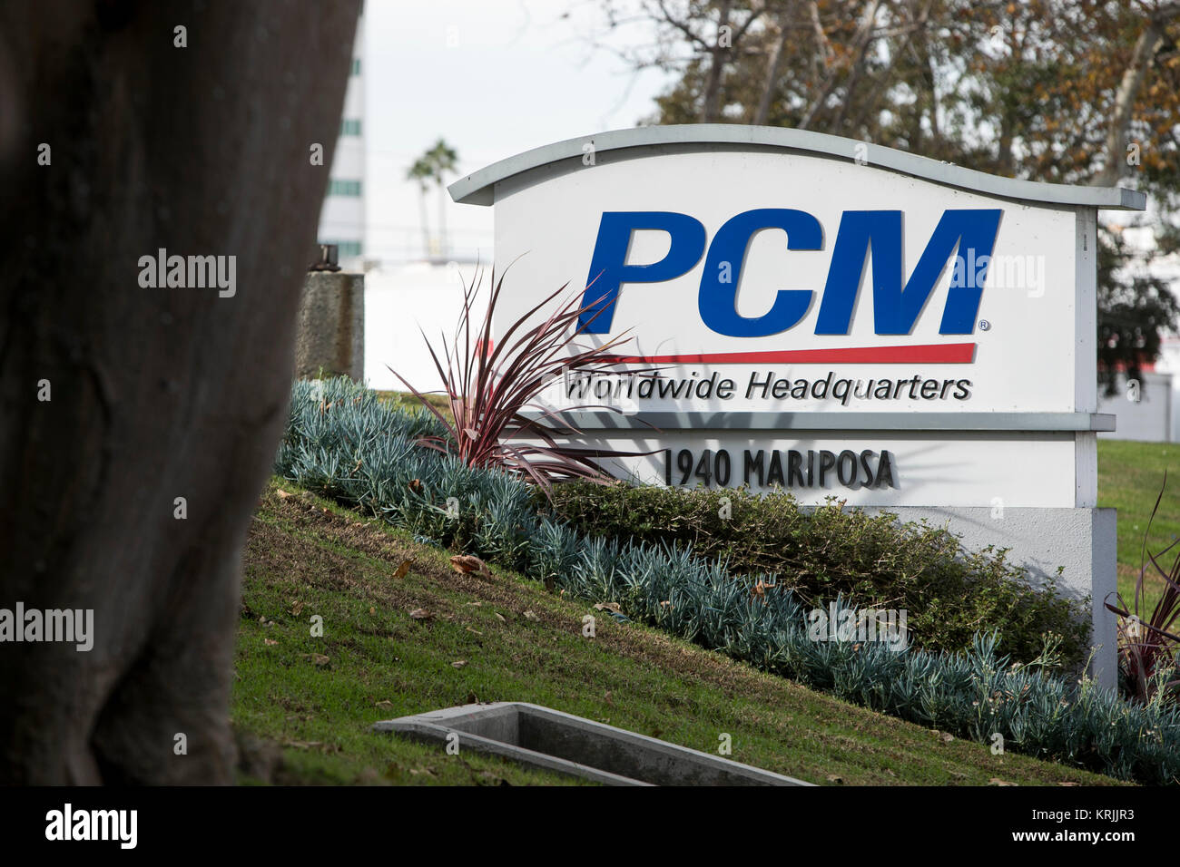 A logo sign outside of the headquarters of PCM in El Segundo ...