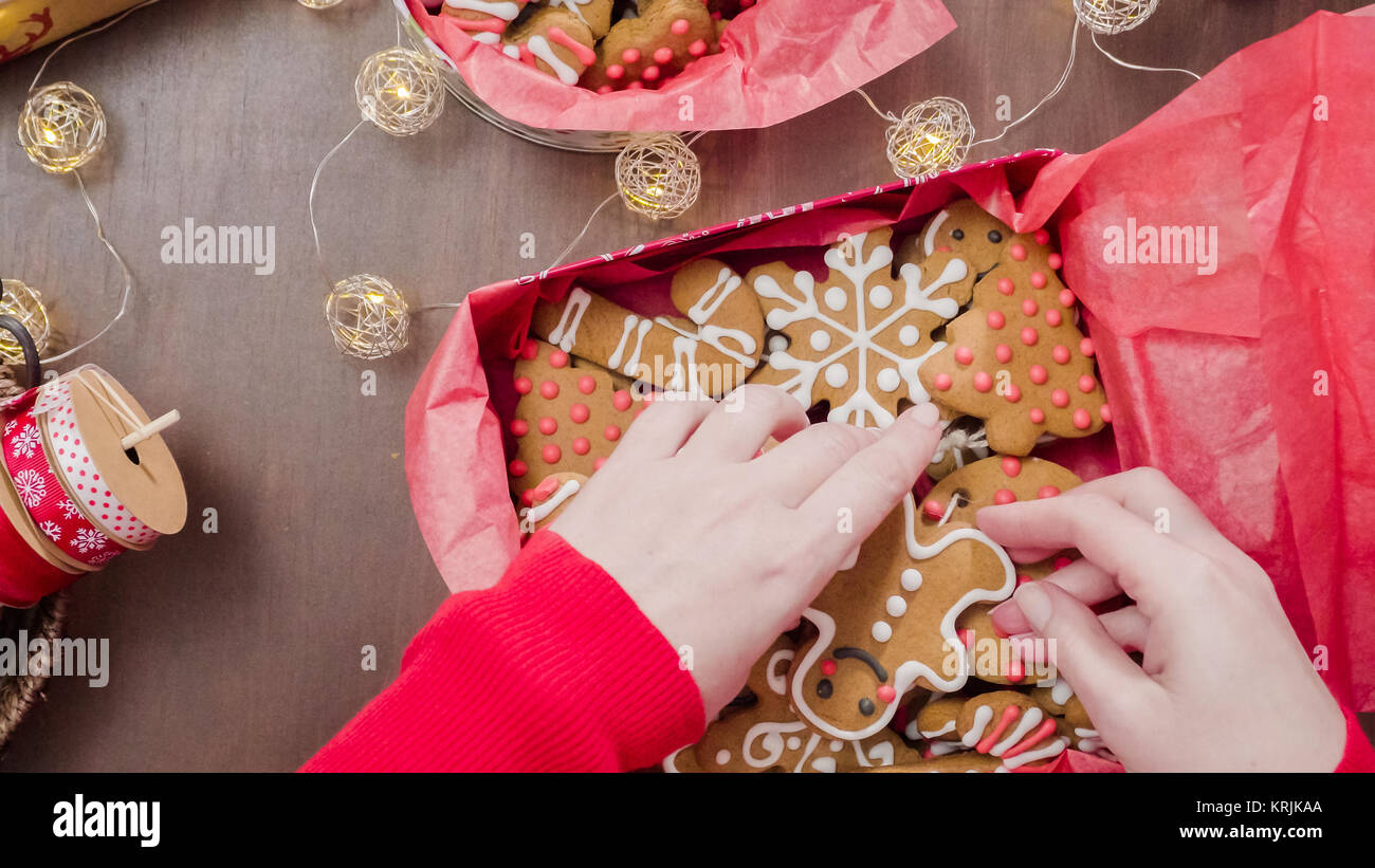 Packaging traditional home made gingerbread cookies as food gifts Stock ...