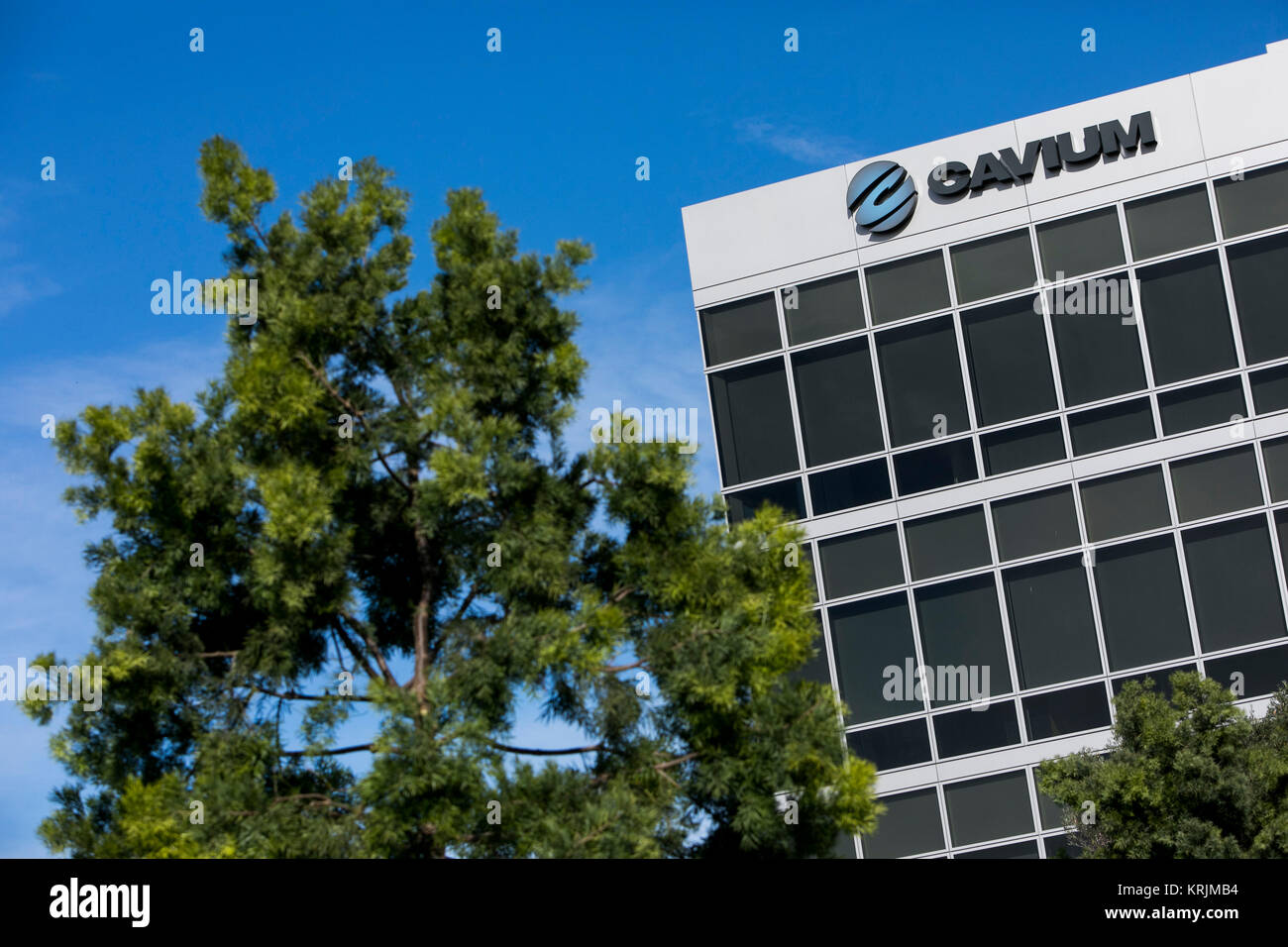 A logo sign outside of a facility occupied by Cavium in Irvine ...