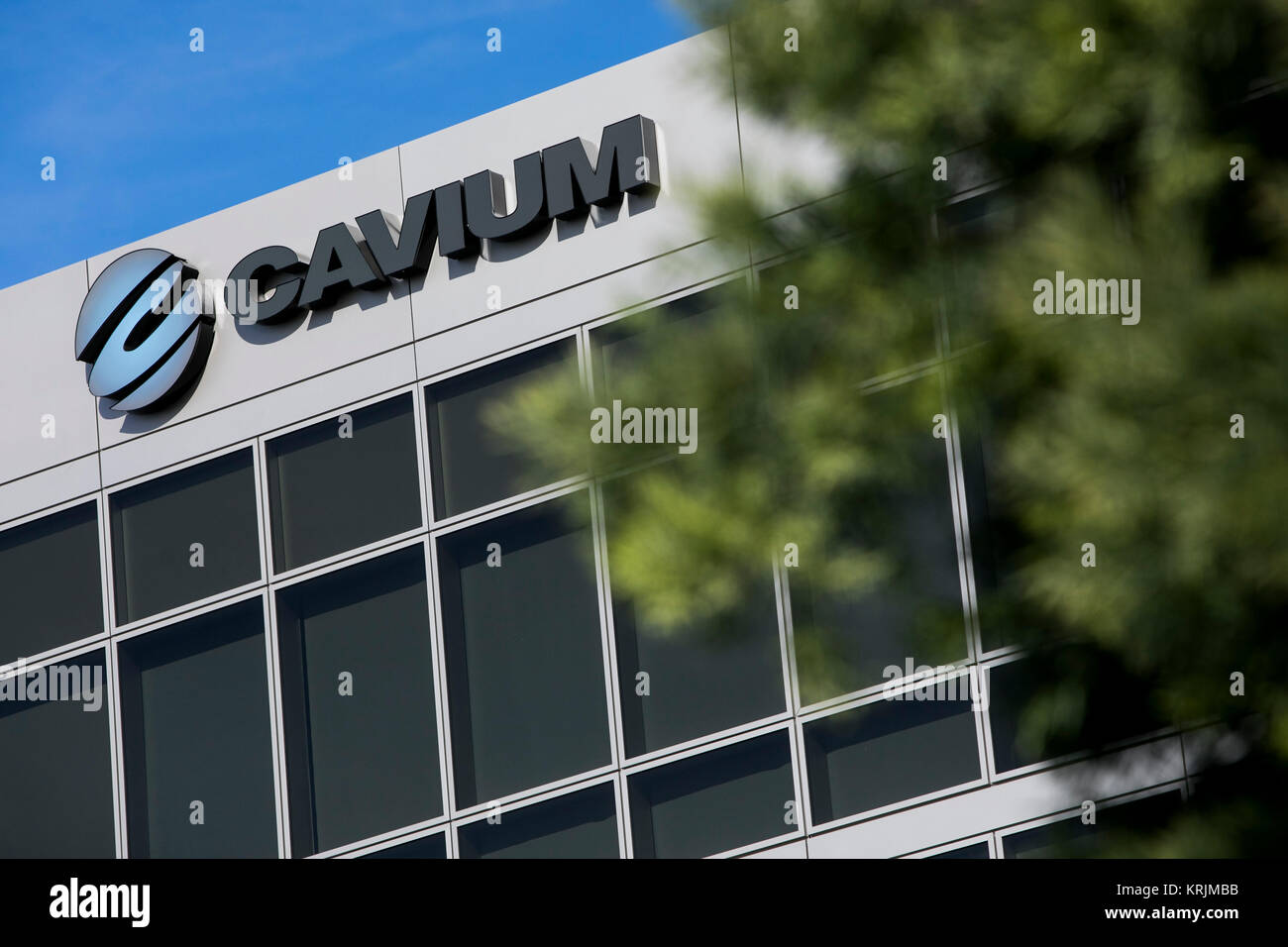 A logo sign outside of a facility occupied by Cavium in Irvine ...