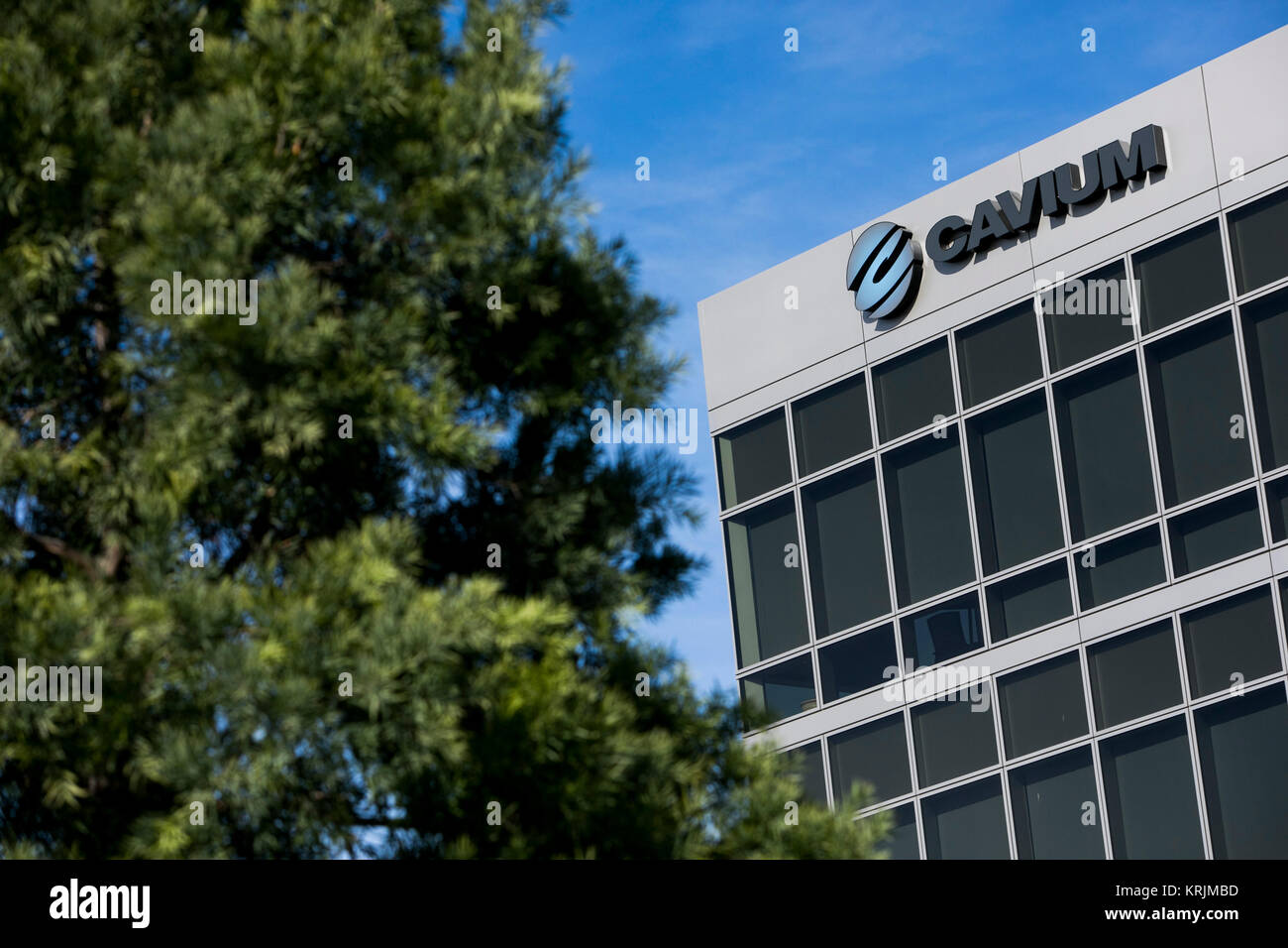 A logo sign outside of a facility occupied by Cavium in Irvine ...