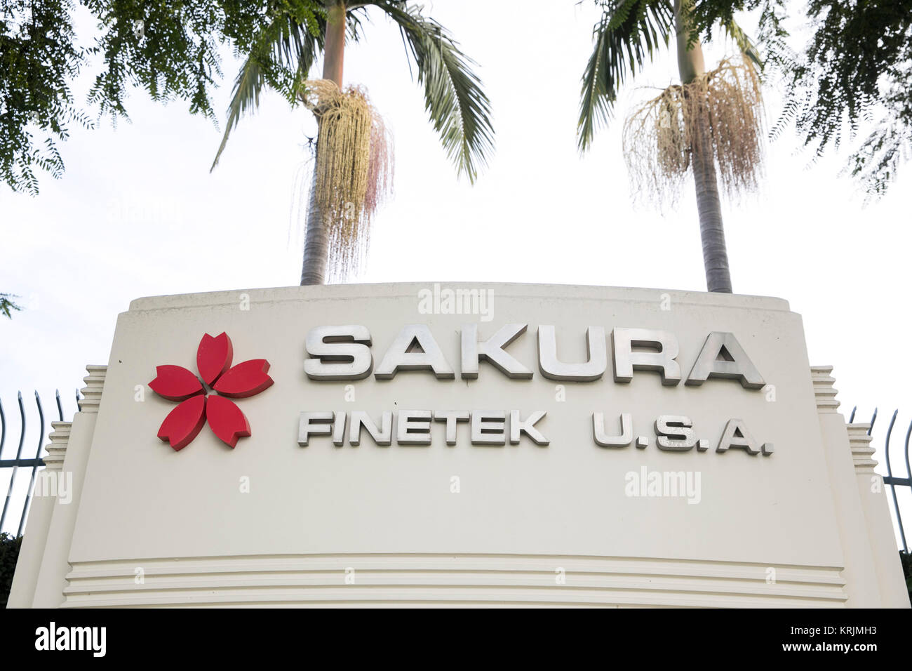 A logo sign outside of a facility occupied by Sakura Finetek in ...