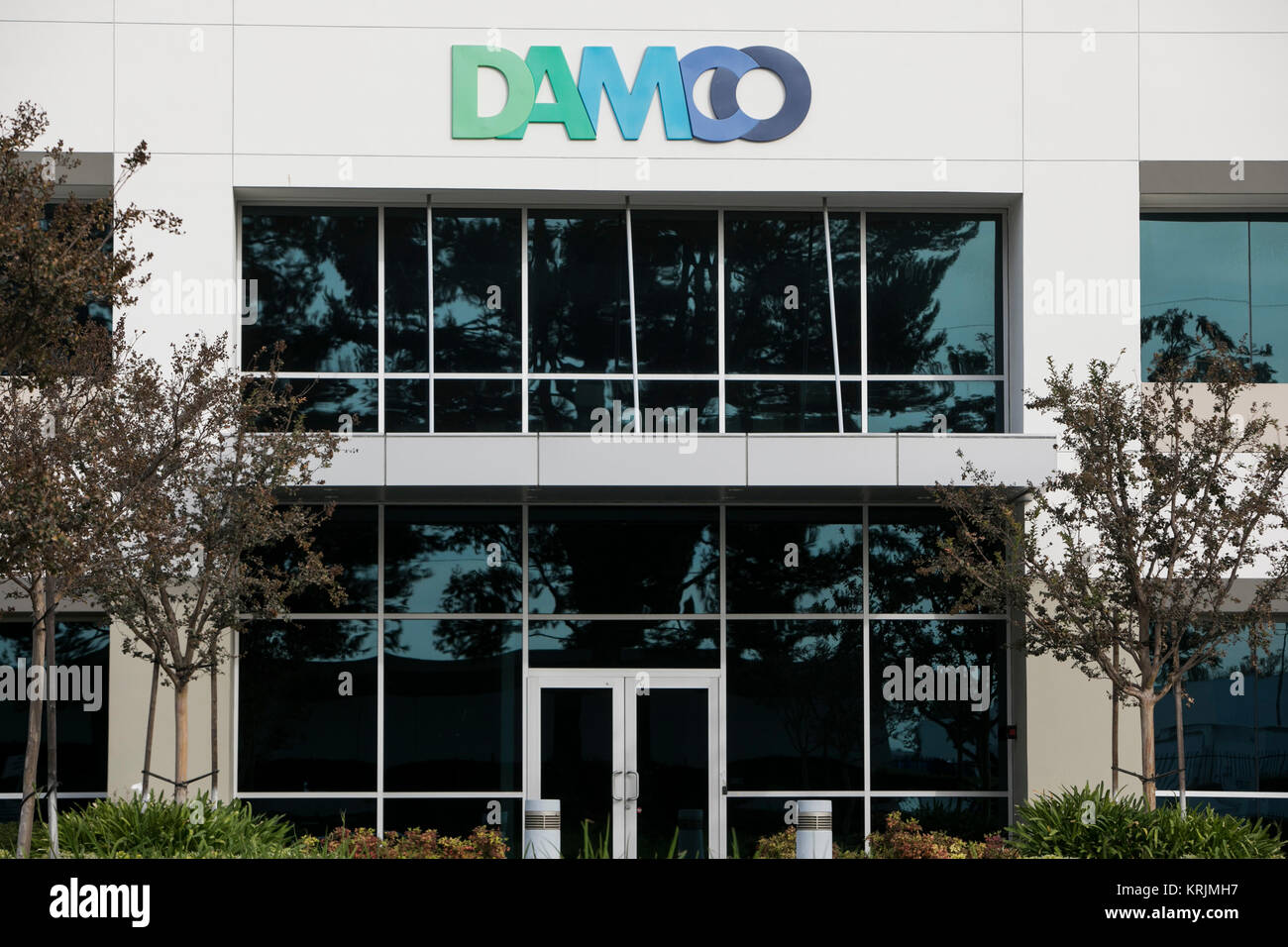 A logo sign outside of a facility occupied by Damco in Carson ...
