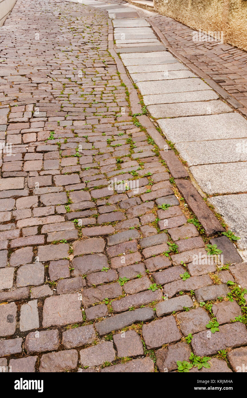 small alley with paving stones Stock Photo - Alamy