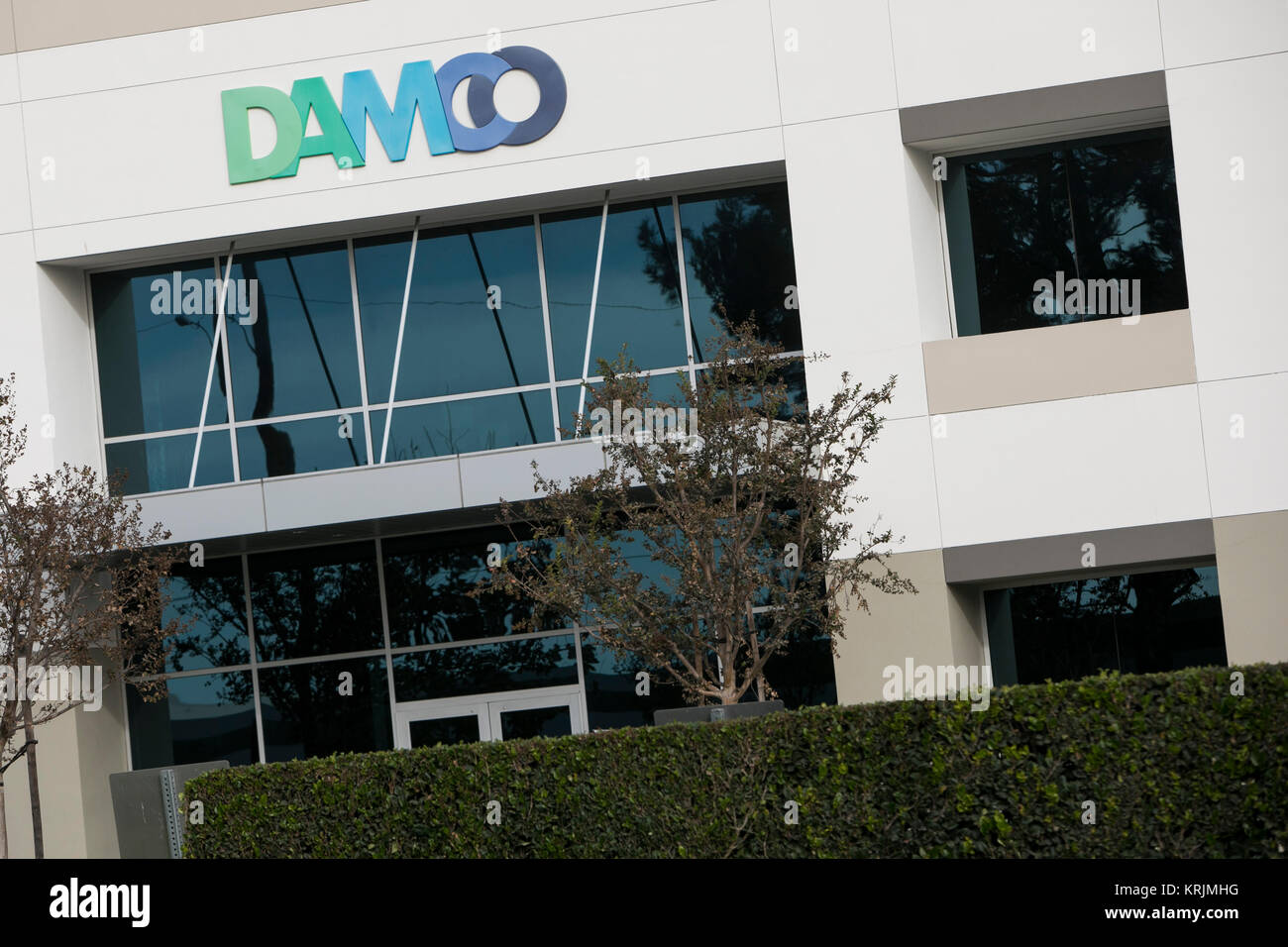 A logo sign outside of a facility occupied by Damco in Carson ...