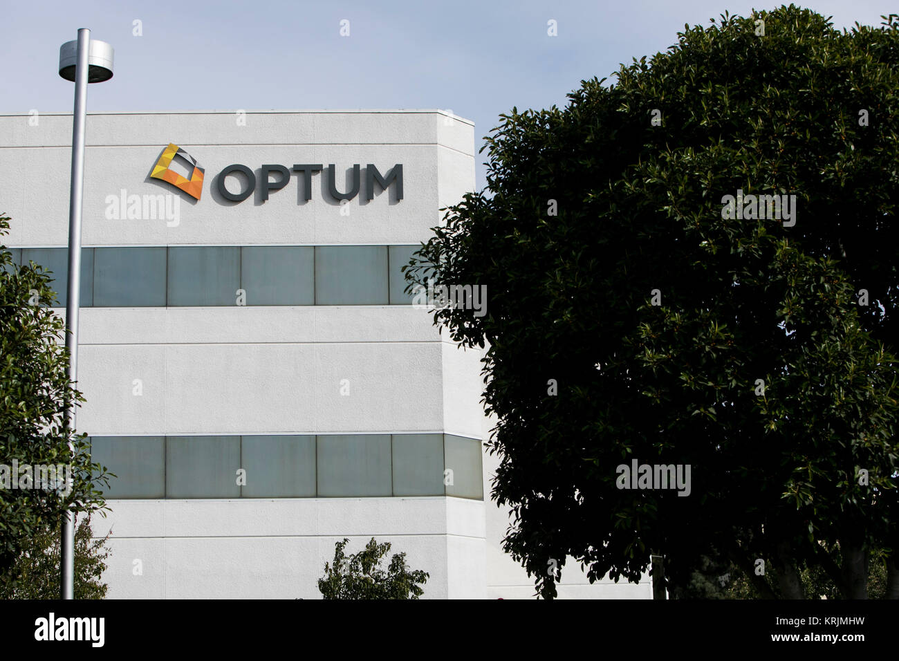 A logo sign outside of a facility occupied by Optum in Irvine ...