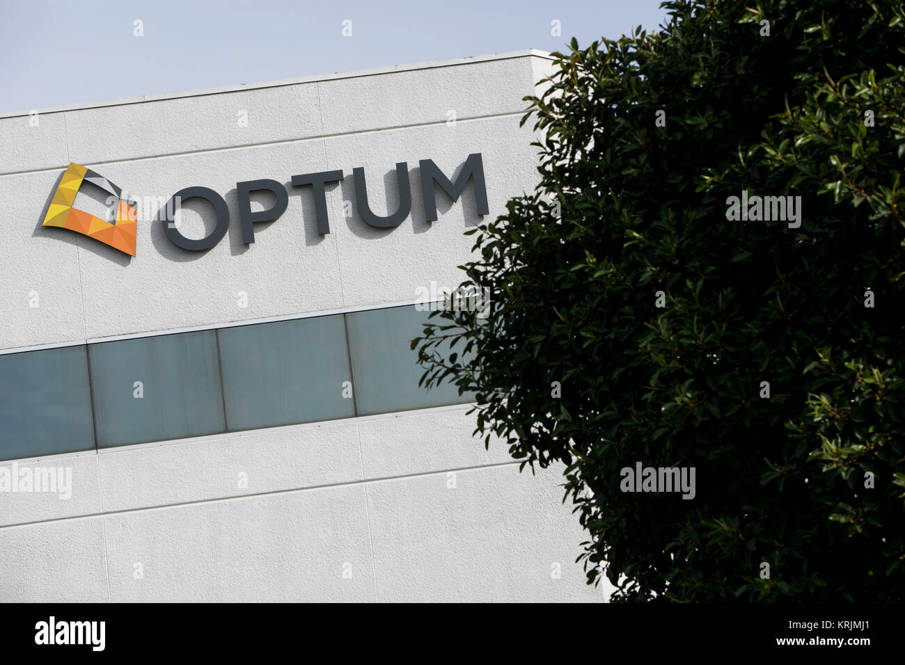 A logo sign outside of a facility occupied by Optum in Irvine ...