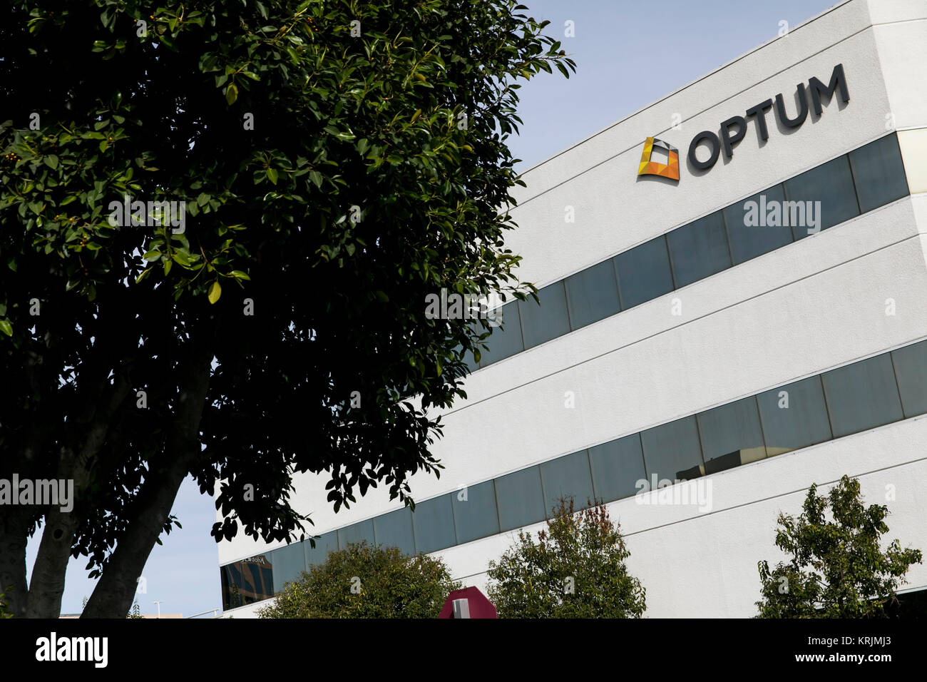 A logo sign outside of a facility occupied by Optum in Irvine ...