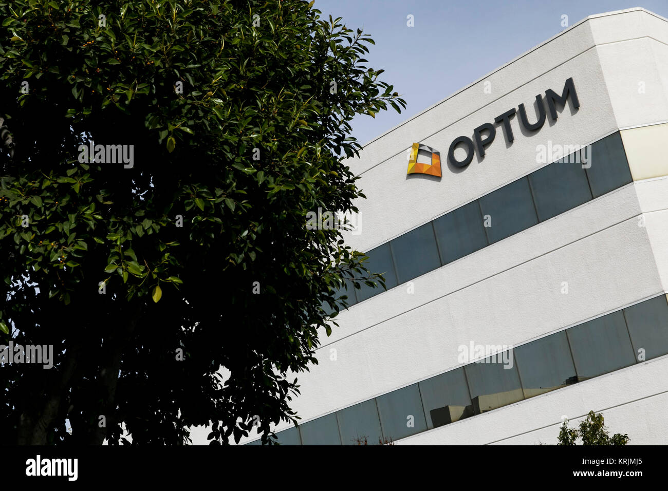 A logo sign outside of a facility occupied by Optum in Irvine ...