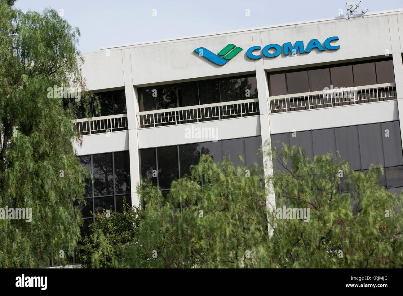 A logo sign outside of a facility occupied by The Commercial Aircraft ...