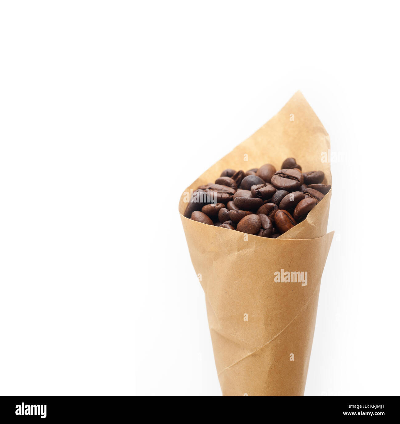 espresso coffee beans on a paper cone Stock Photo - Alamy