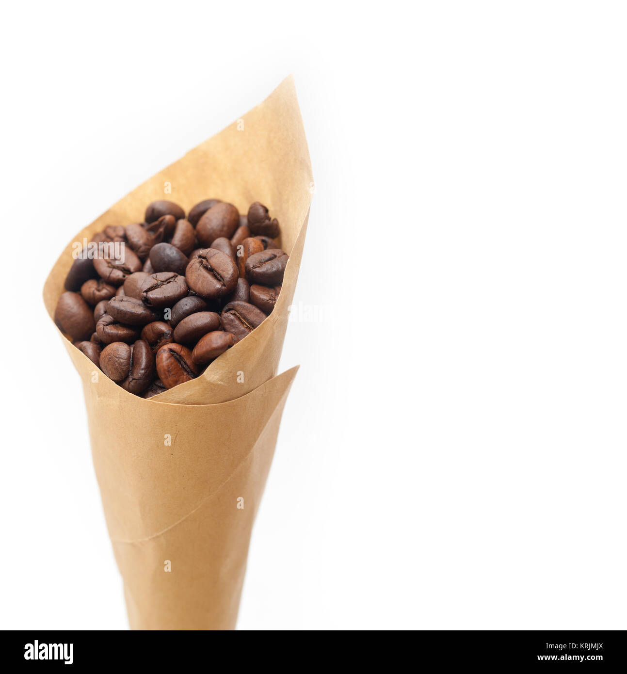 espresso coffee beans on a paper cone Stock Photo - Alamy