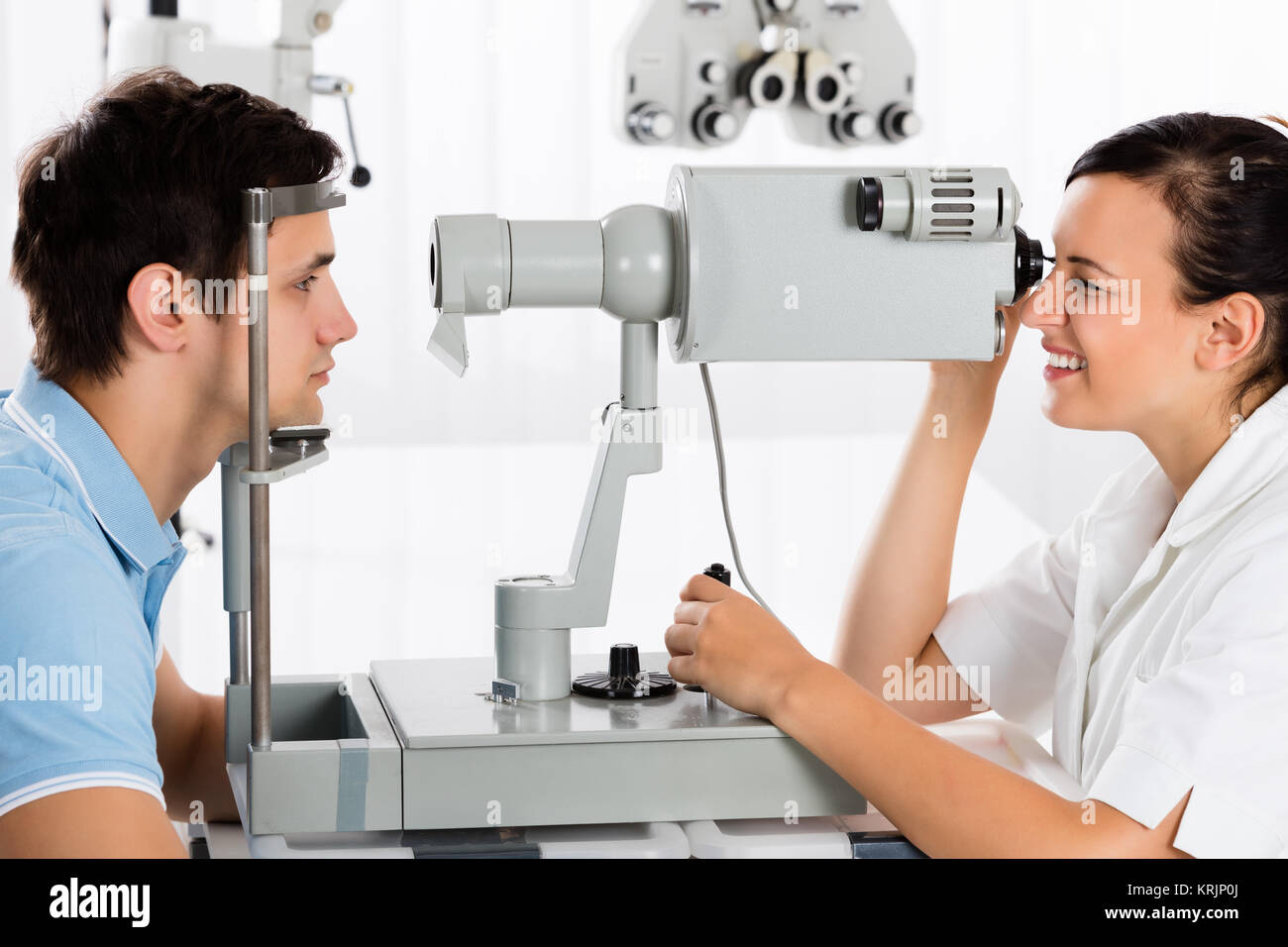 An Optometrist Doing Vision Testing For Male Patient Stock Photo - Alamy