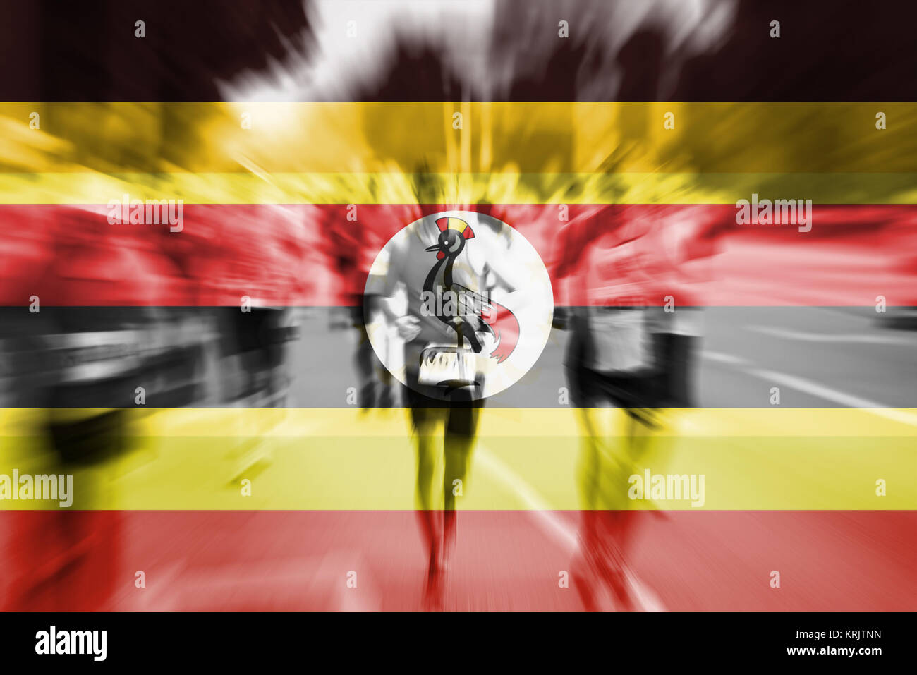 marathon runner motion blur blending with uganda flag Stock Photo - Alamy