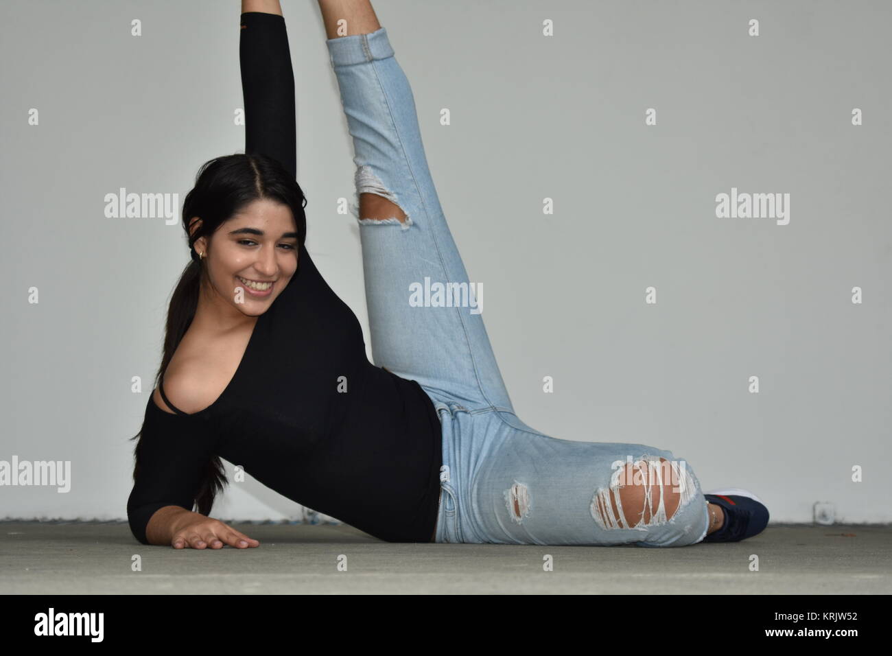 Stretching Latina Female Stock Photo - Alamy