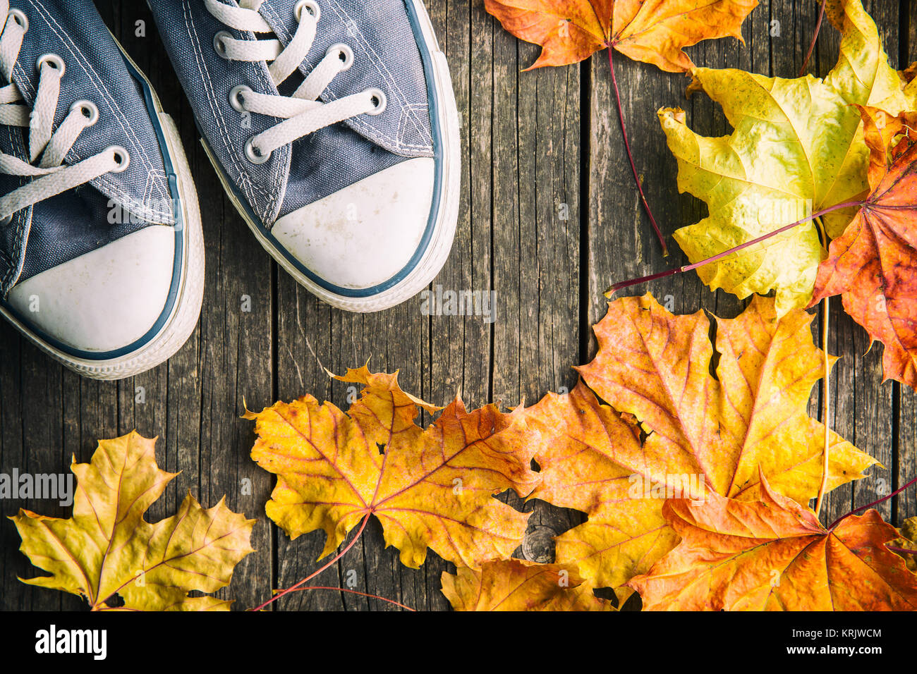 Shoes and autumn leaves Stock Photo - Alamy