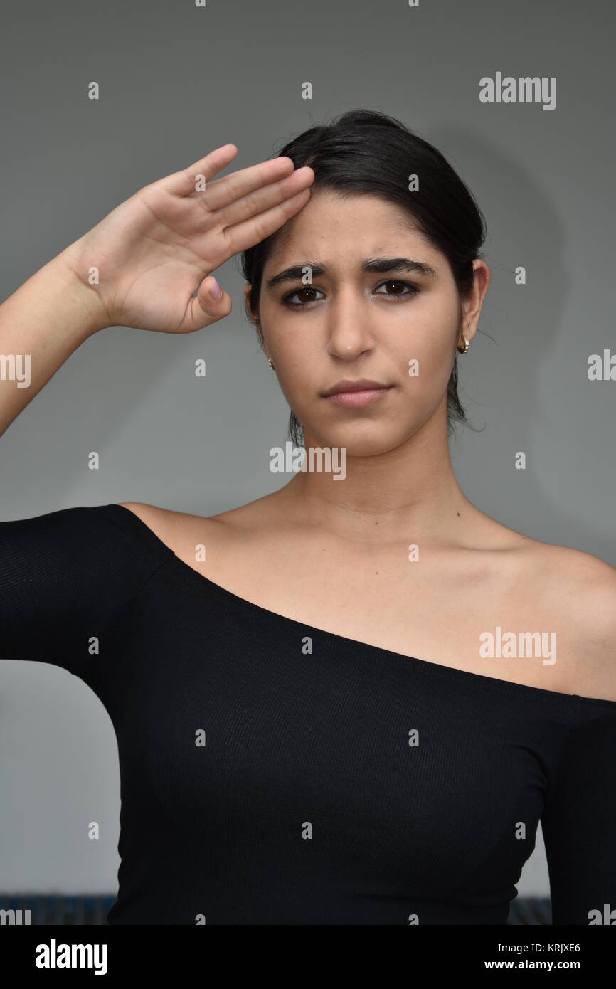 Cute Female Saluting Stock Photo - Alamy