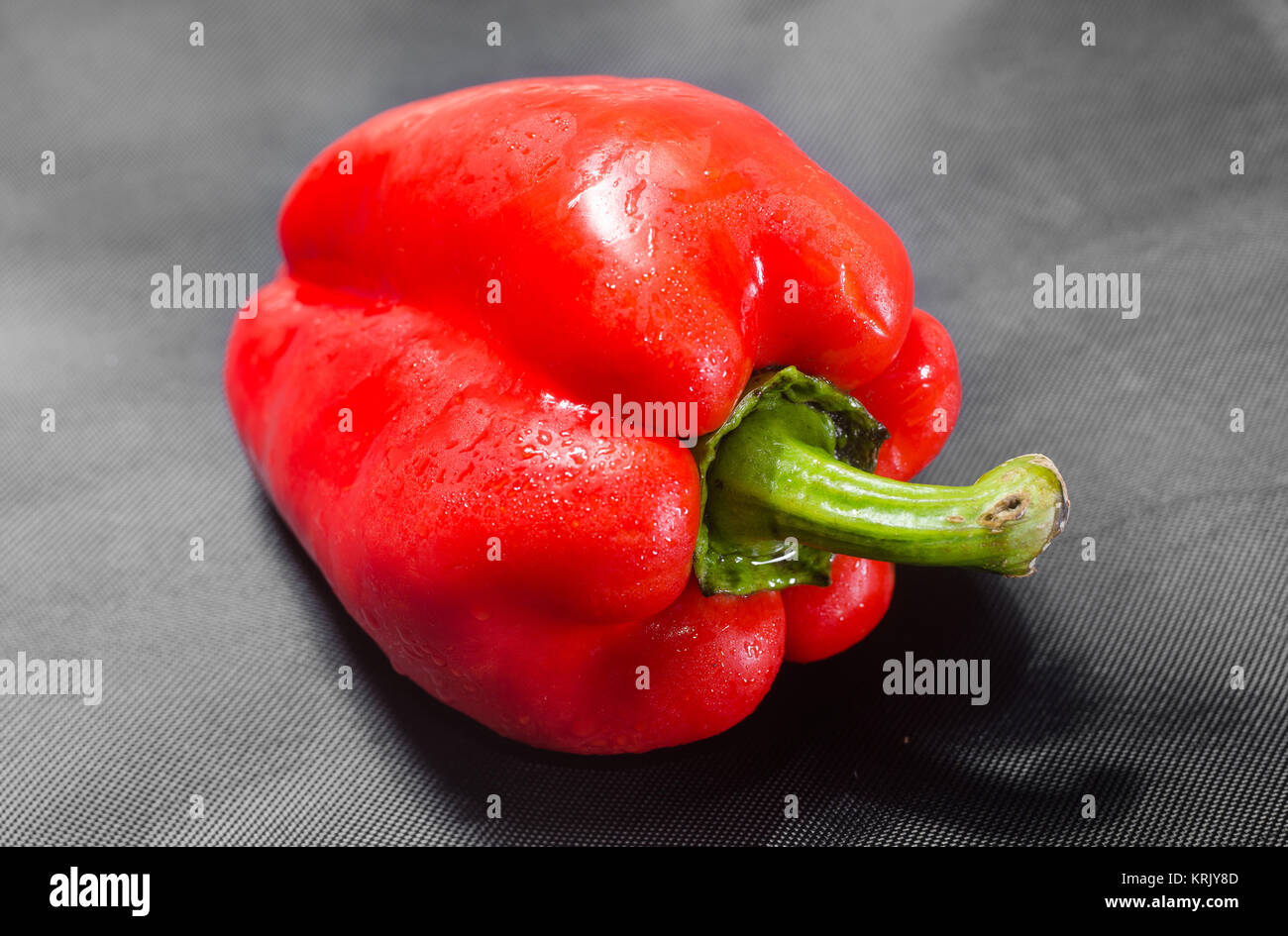 A whole pepper and pepper slices Stock Photo - Alamy