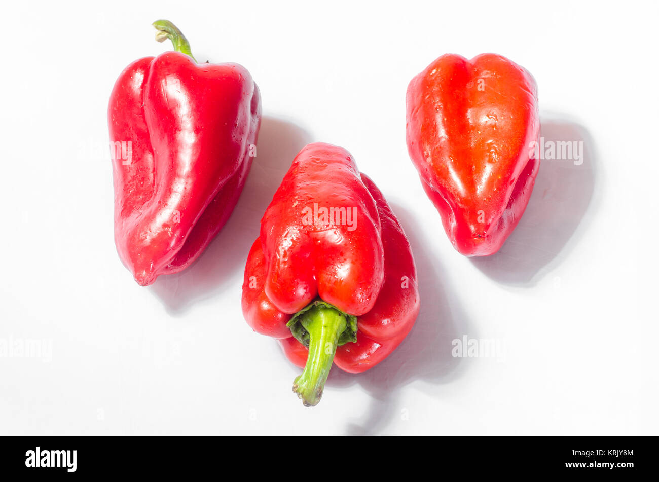 A whole pepper and pepper slices Stock Photo - Alamy