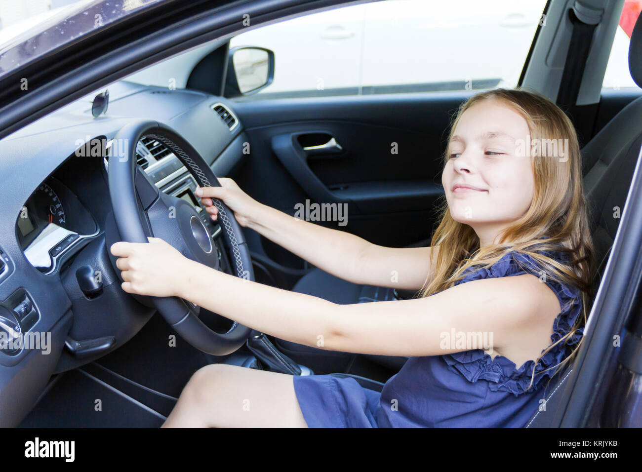 Cute girl in the car Stock Photo - Alamy