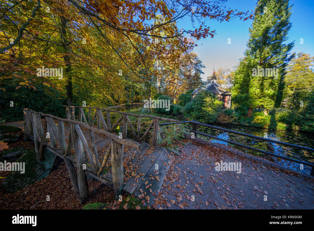 autumn with chapel and bridge Stock Photo - Alamy