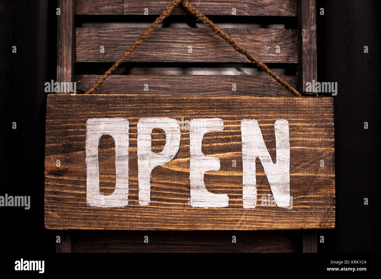 Open sign hanging in a door Stock Photo - Alamy