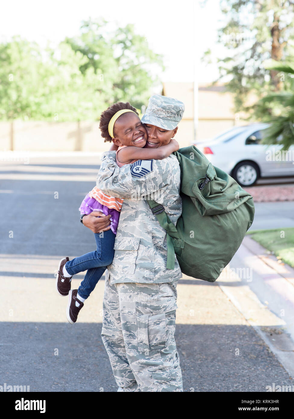 African Military Soldier Hugging Daughter High Resolution Stock ...