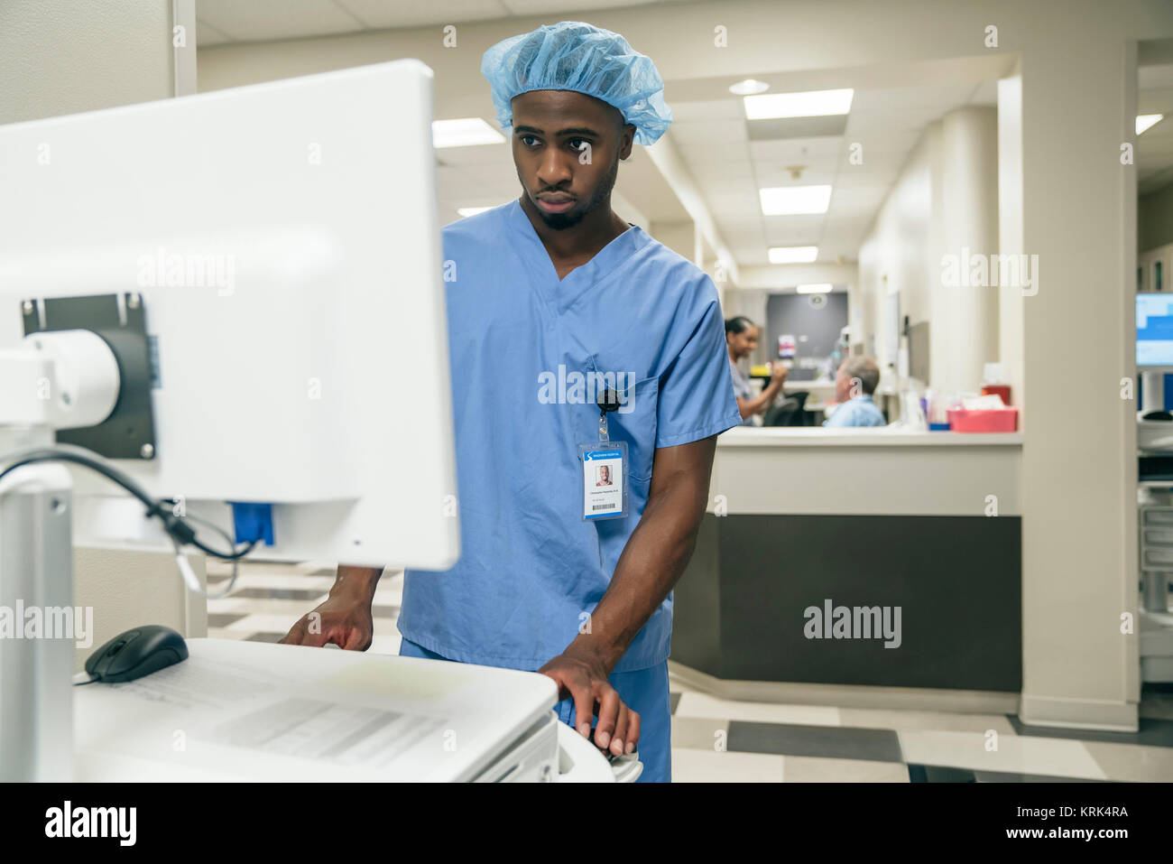 Nurse using a computer Stock Photo - Alamy
