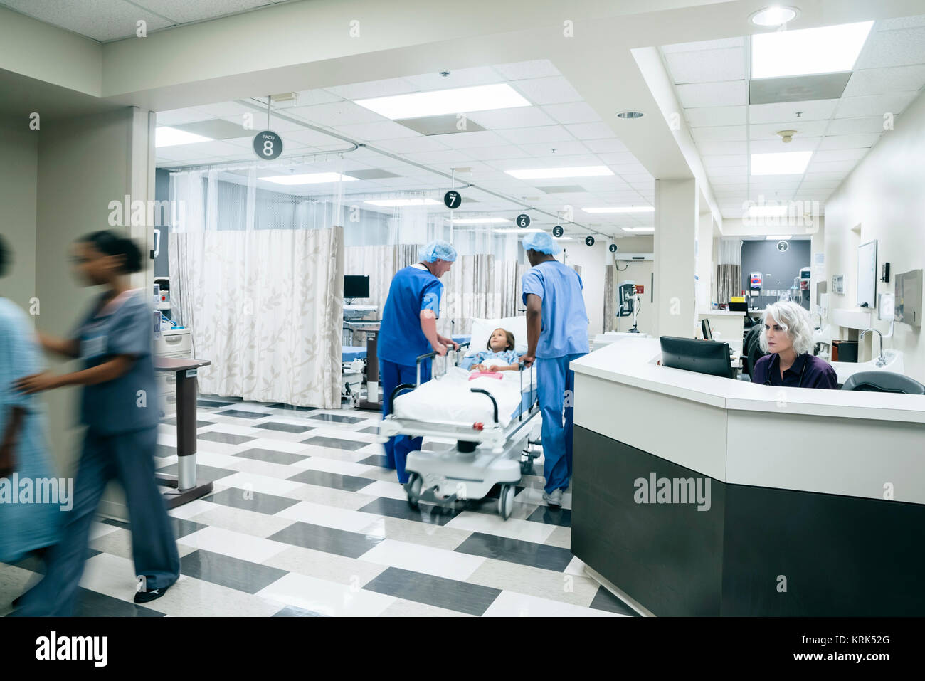 Nurses station in busy hospital Stock Photo - Alamy