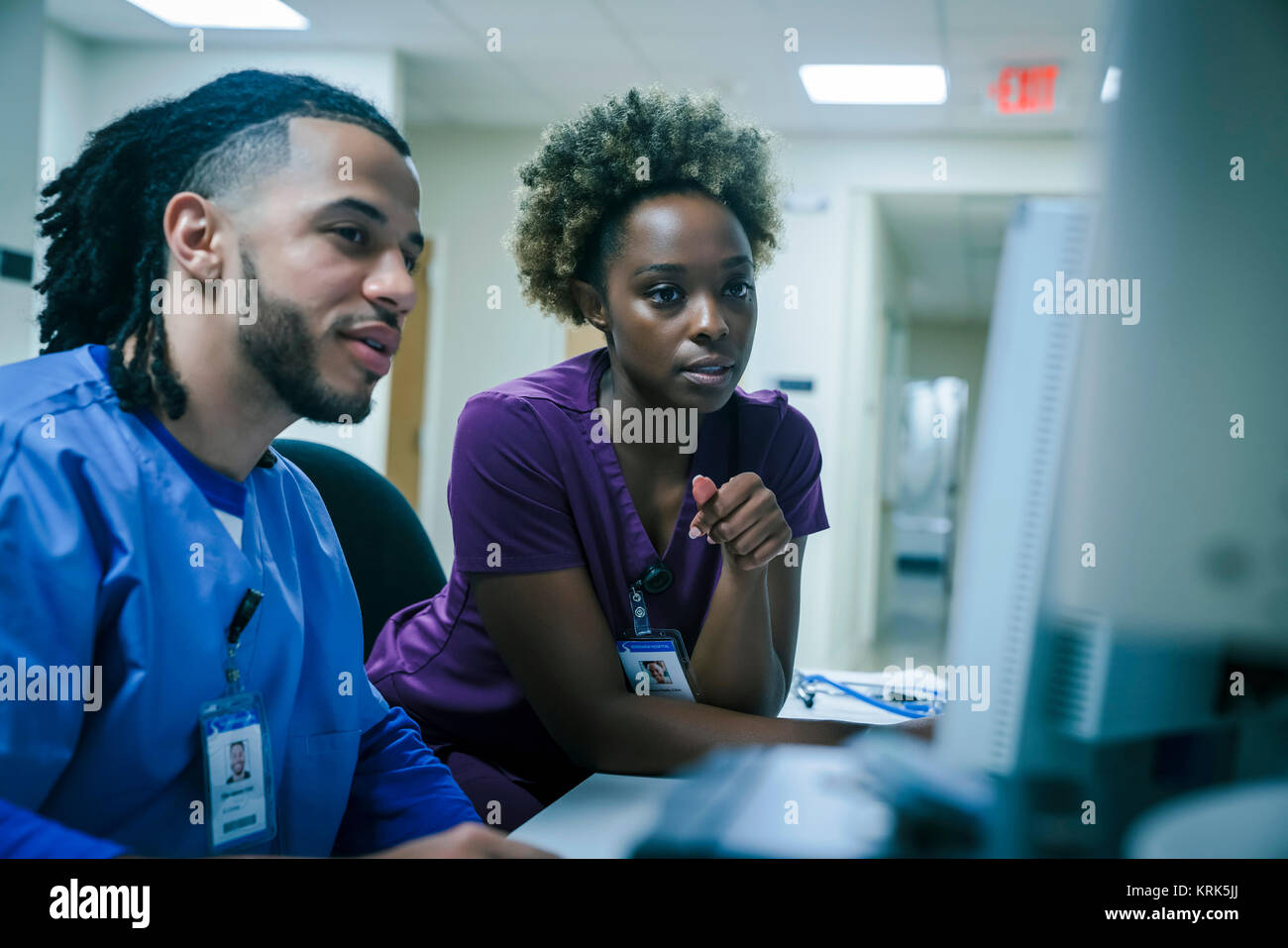 Nurses using computer Stock Photo - Alamy