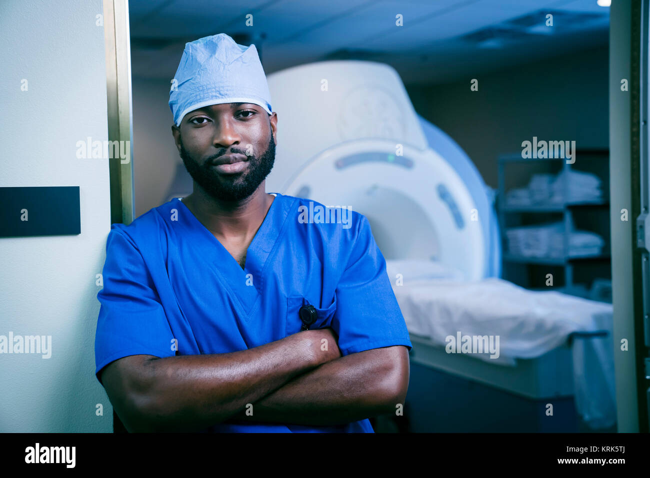 Portrait of confident black nurse near scanner Stock Photo - Alamy