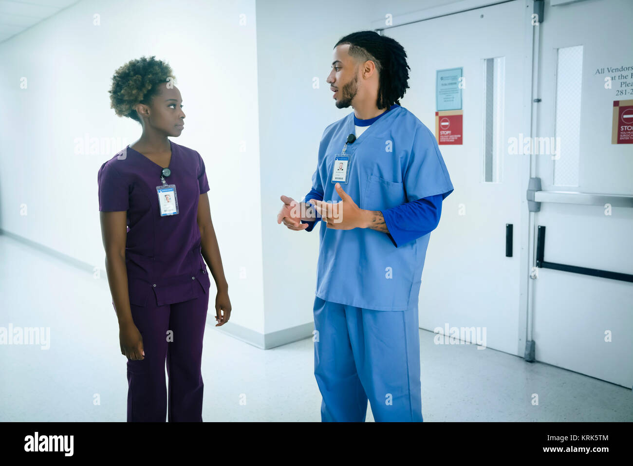 Nurses talking in hospital Stock Photo - Alamy