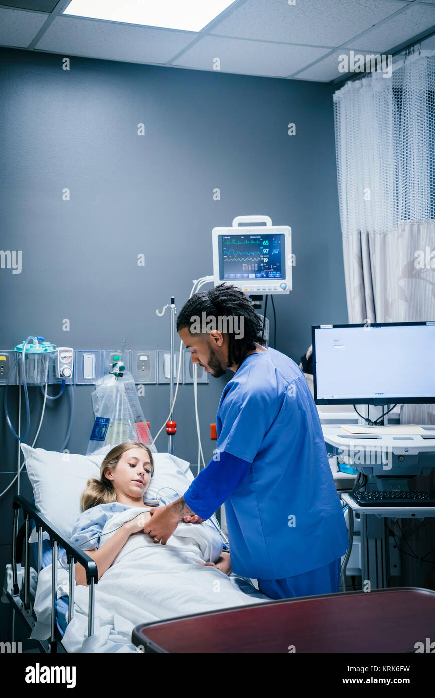 Nurse holding hand of patient in hospital Stock Photo - Alamy