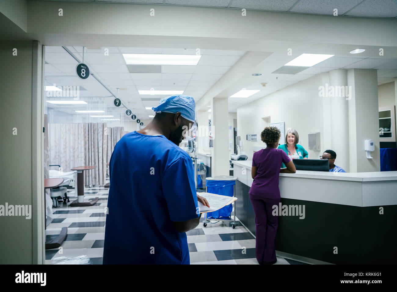 Doctor nurses reading medical chart hi-res stock photography and images ...