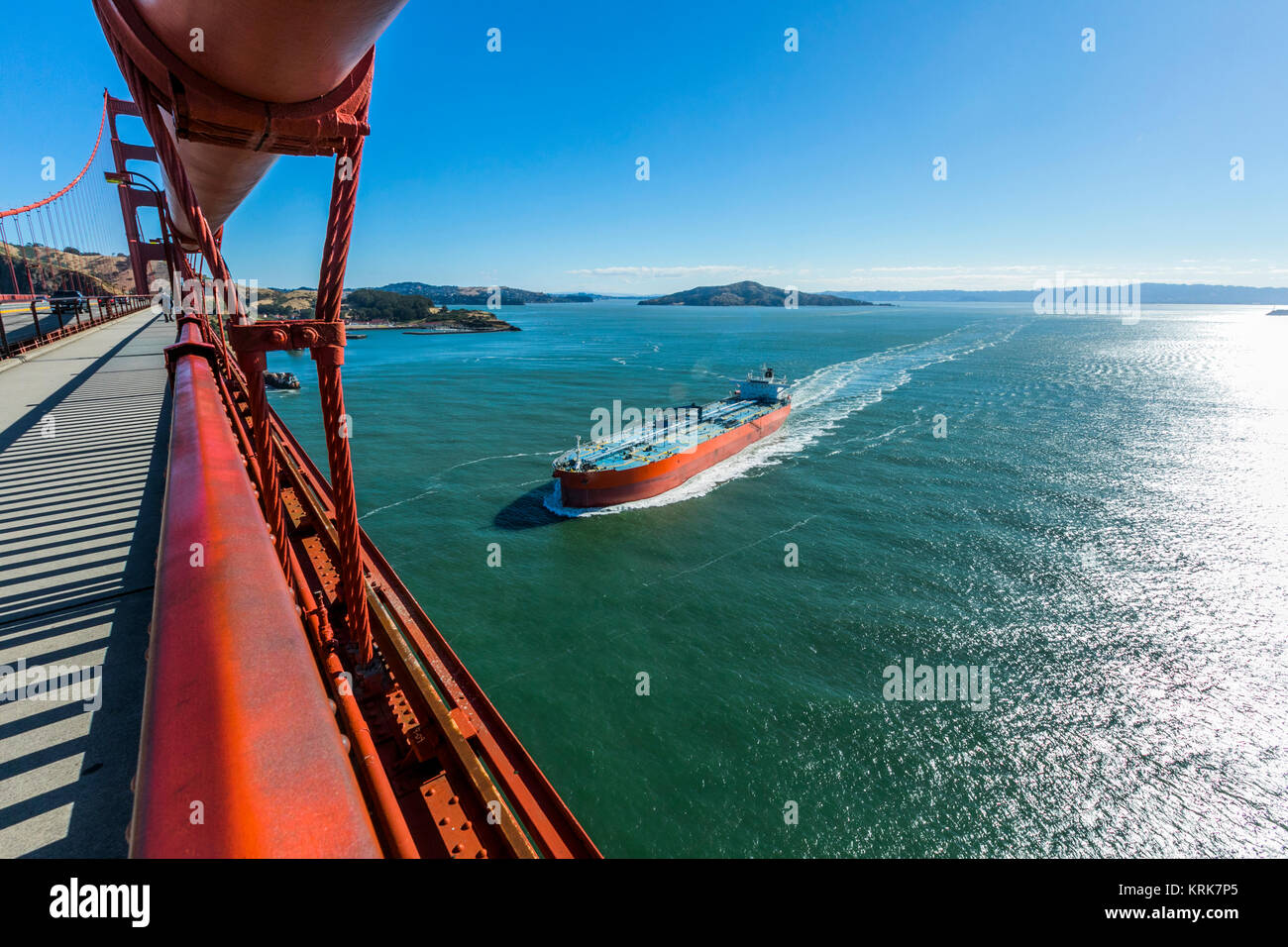 Bridge over boat in bay Stock Photo - Alamy