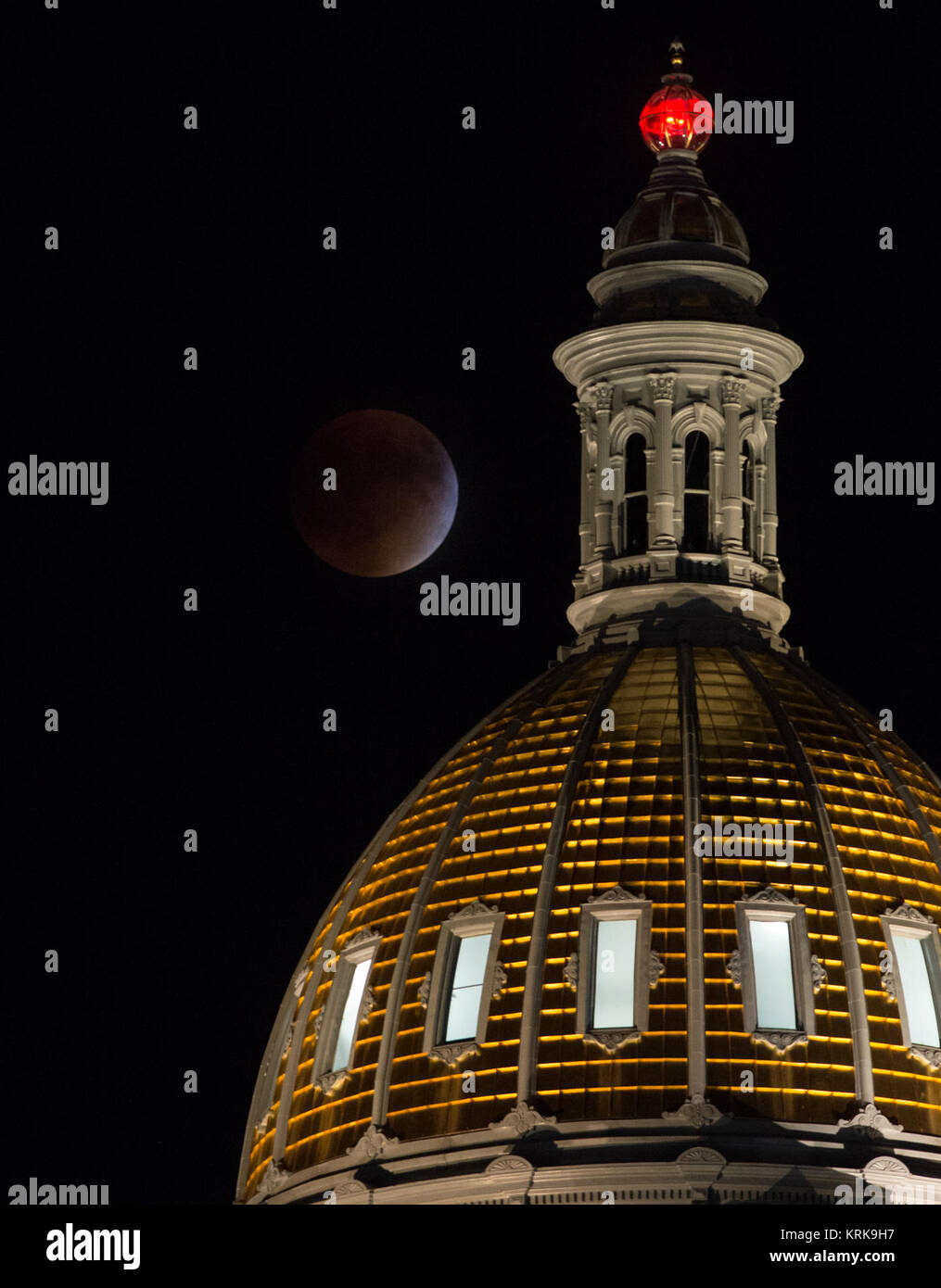 A perigee full moon, or supermoon, is seen during a total lunar eclipse ...