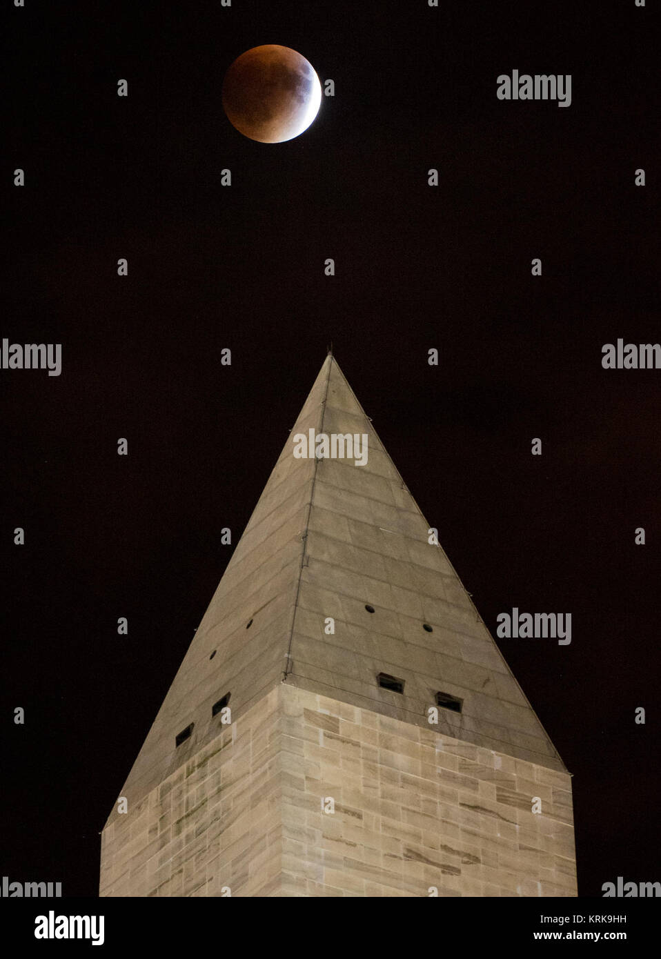 A perigee full moon, or supermoon, is seen behind the Washington ...