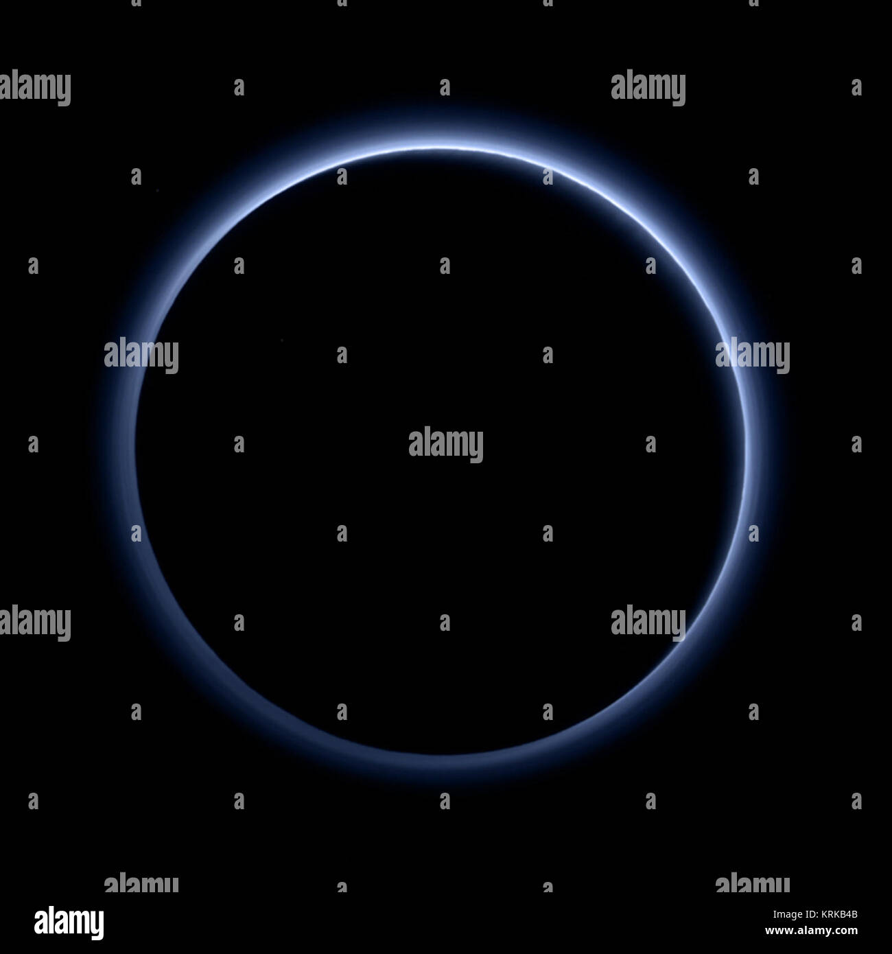 Blue hazes over backlit Pluto Stock Photo - Alamy