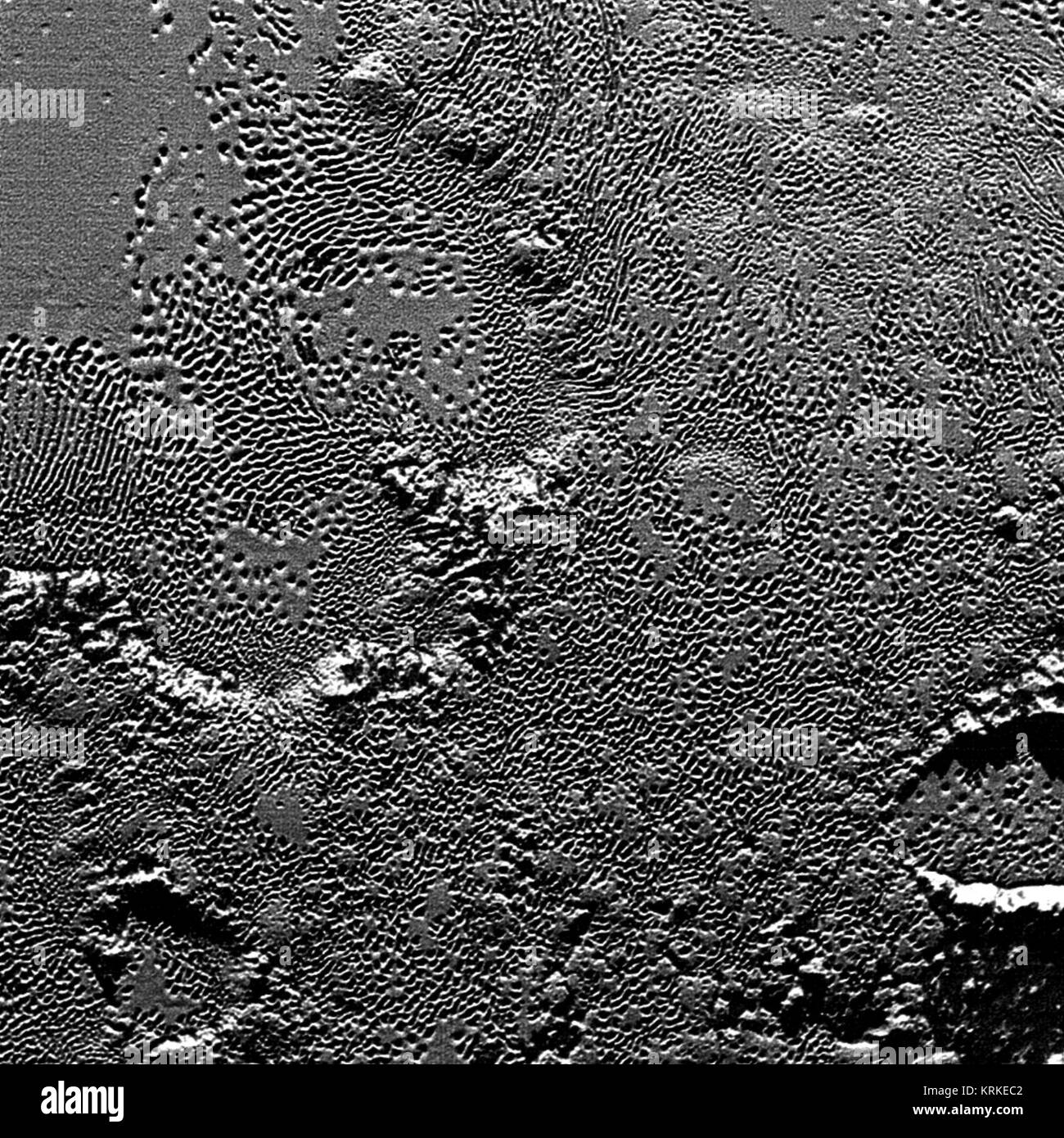 PIA20212 crop - pits in southeast Sputnik Planum Stock Photo - Alamy