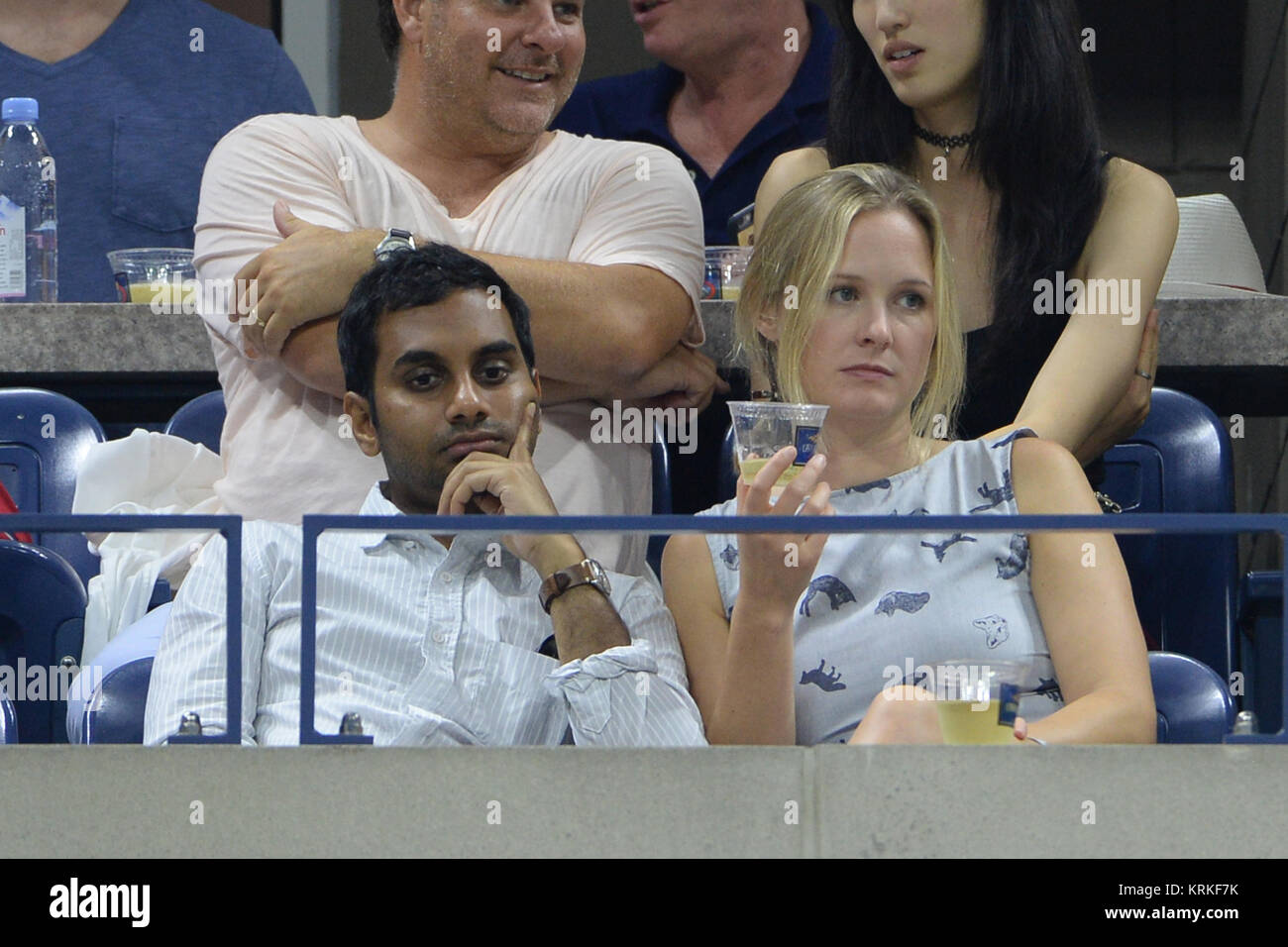 NEW YORK, NY - SEPTEMBER 08: Aziz Ansari watches Serena Williams of the ...