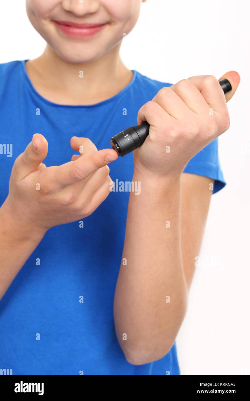 diabetic girl measuring sugar level with a glucometer Stock Photo - Alamy